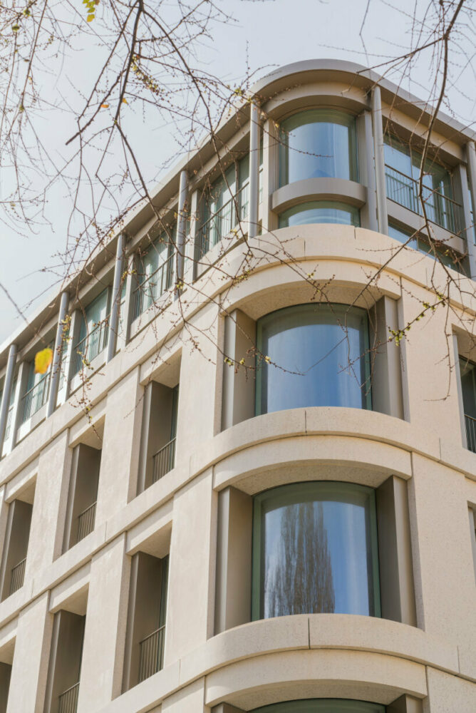 defying orthogonality with curved windows that merge architecture and ...