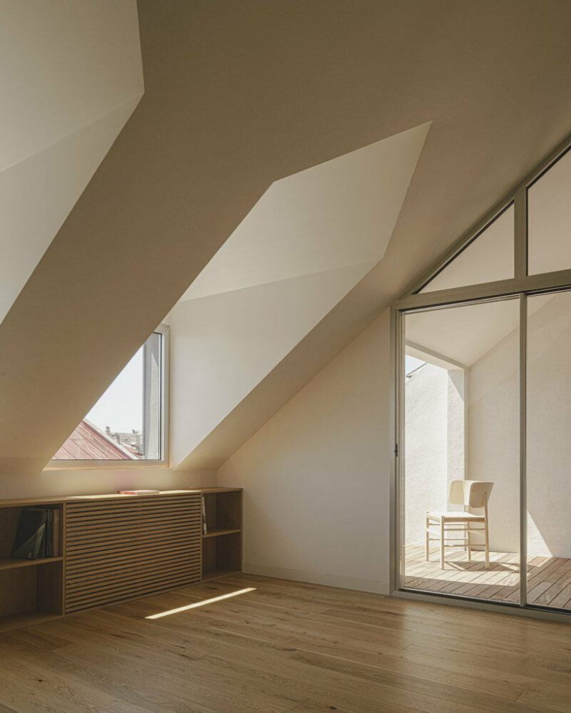 zooco estudio converts madrid office space into duplex apartment