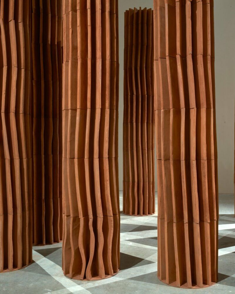 sahel alhiyari presents terracotta columns at design doha