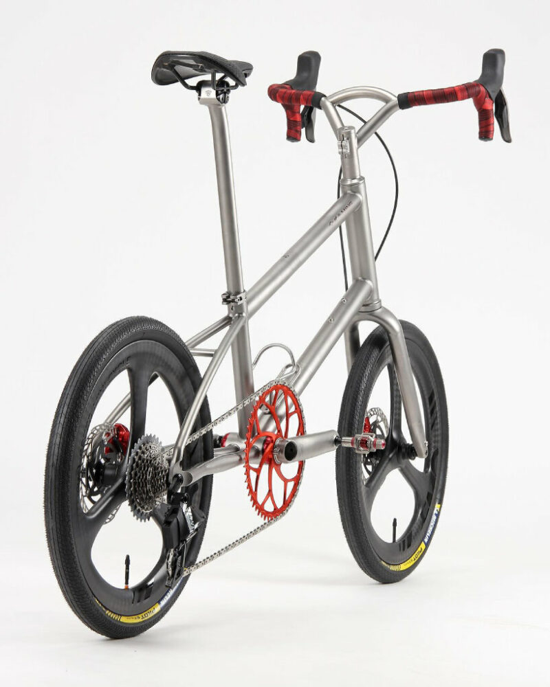 firefly’s titanium mini travel bike unfastens easily to fit in RIMOWA ...