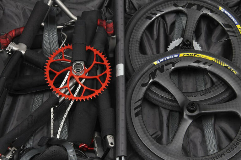 firefly’s titanium mini travel bike unfastens easily to fit in RIMOWA ...