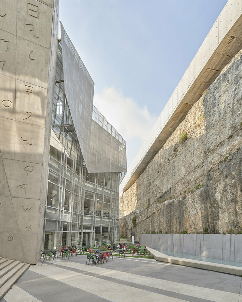 ancient alphabets carved into the facade of jabbra library in lebanon