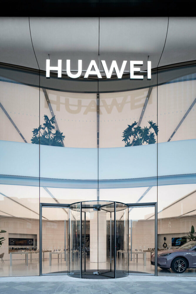 undulating glazed panels enfold superimpose's huawei flagship store in ...