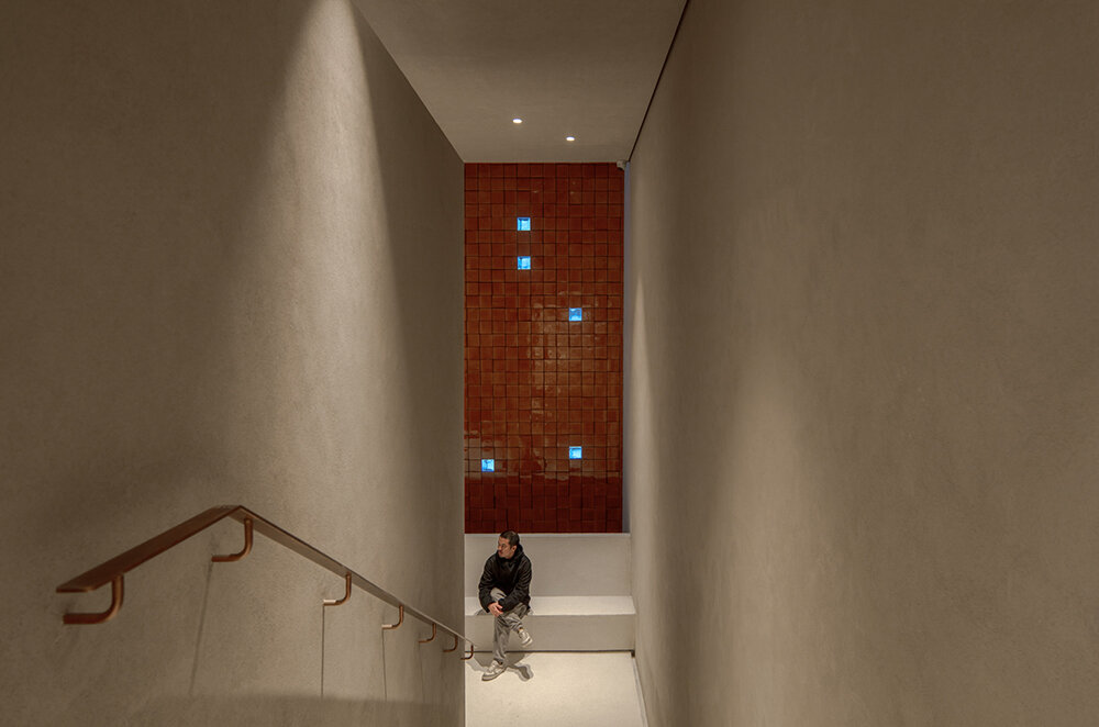 WAAAM museum's glazed yellowish tiles enliven beigou village in china