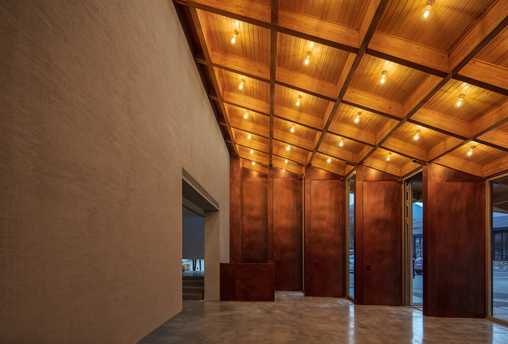 WAAAM museum's glazed yellowish tiles enliven beigou village in china