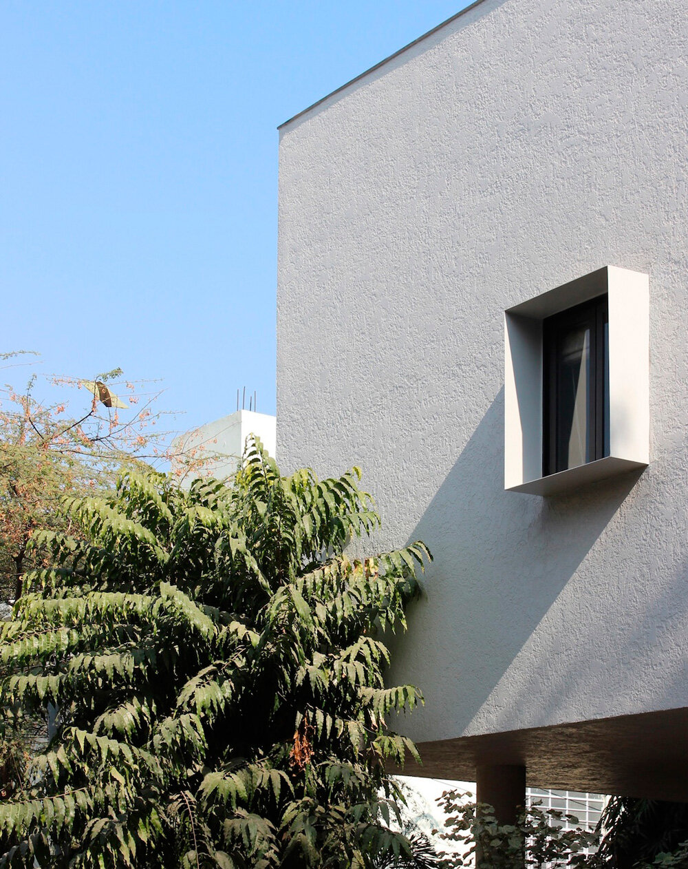 red sandstone jali lattice encloses jaipur house's facade by nuar studios