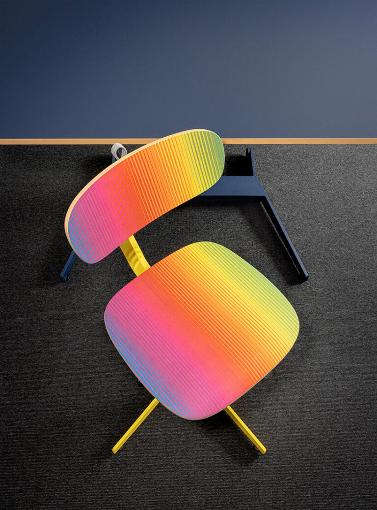 AMDL CIRCLE bends steel-back mara TYPO chair with robust yet soft creases