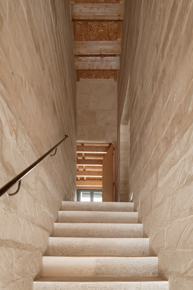 thick marés sandstone walls compose 19 social housing, salvador espriu ...