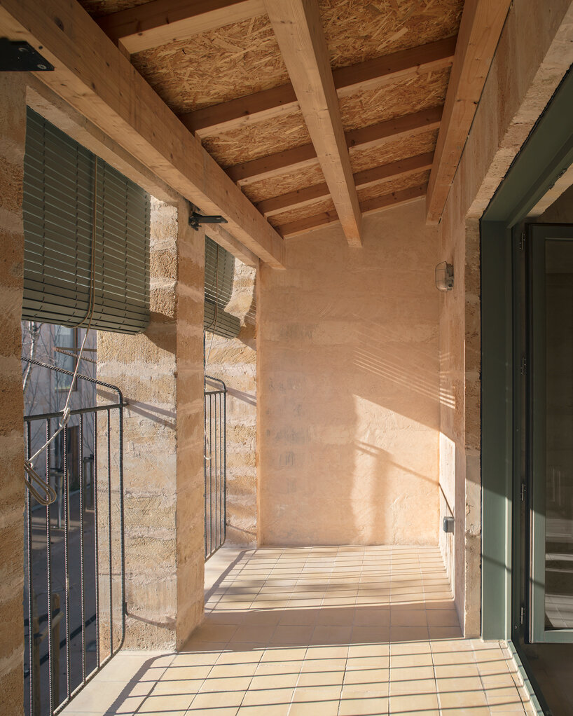 thick marés sandstone walls compose 19 social housing, salvador espriu ...