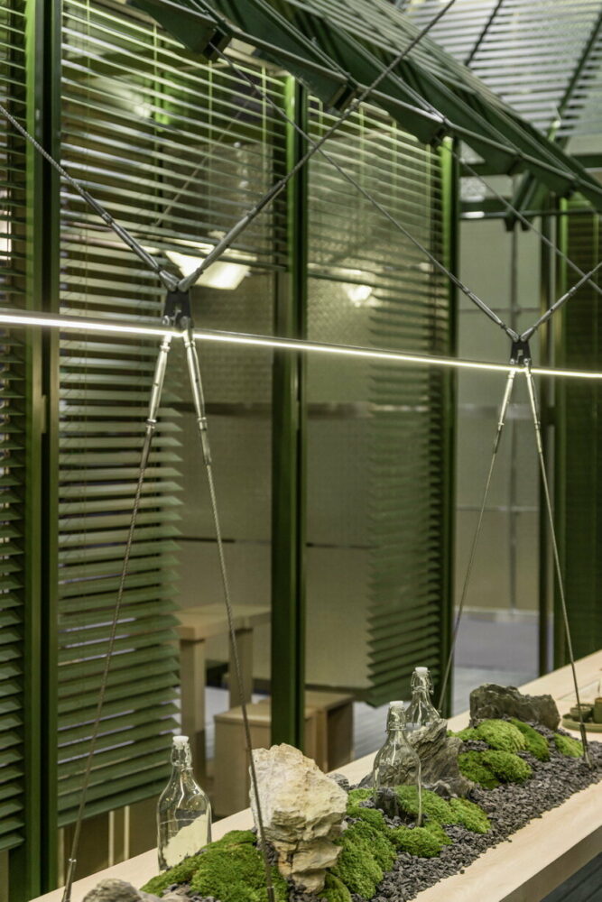 dynamic green louvers define transformative tea concept store in china