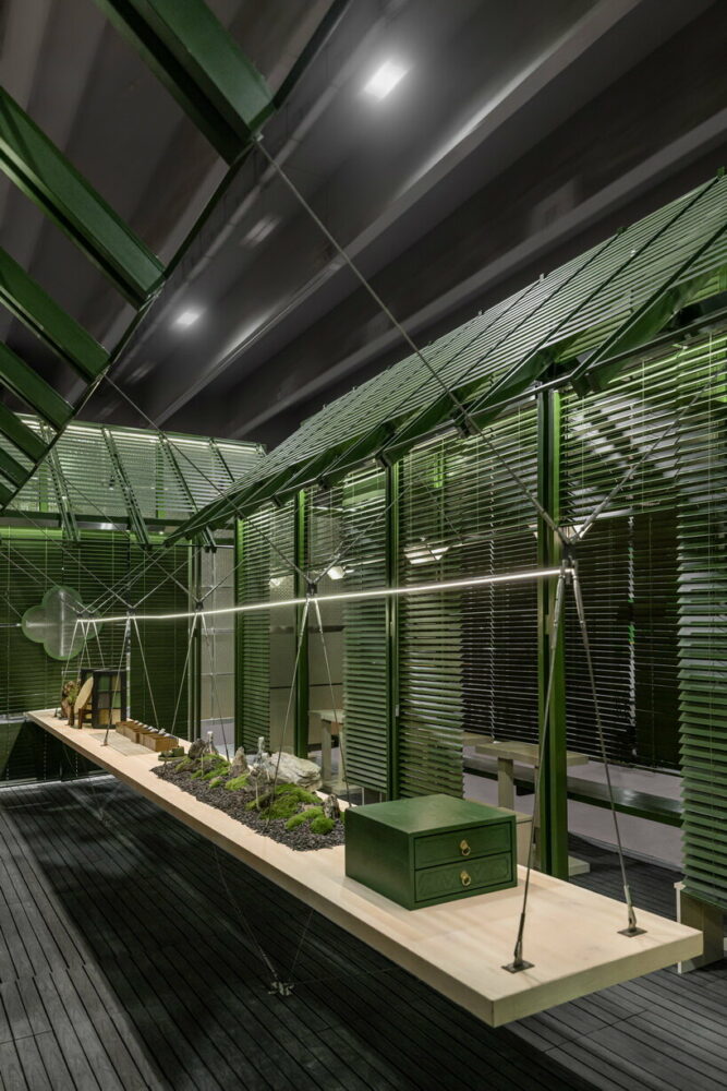 dynamic green louvers define transformative tea concept store in china