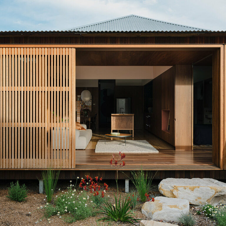 curious practice revives 'aru house' with brickwork & timber screens