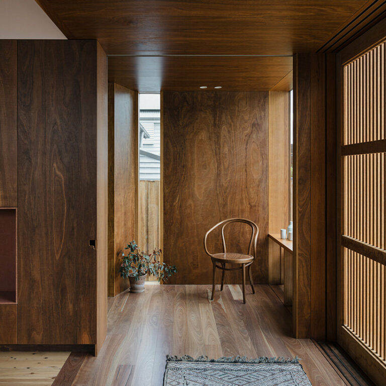 curious practice revives 'aru house' with brickwork & timber screens