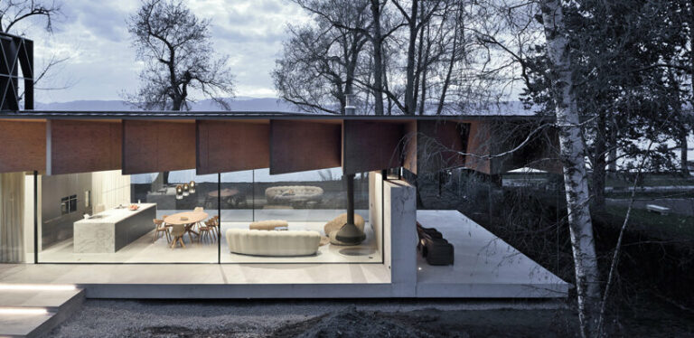 jagged wooden structure unfolds on top of ba holz house sitting along ...