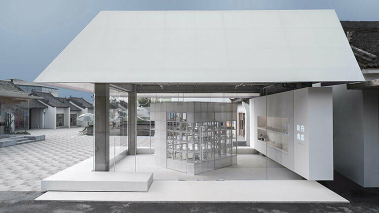 translucent pitched roof tops glass-clad store by designRESERVE in ...