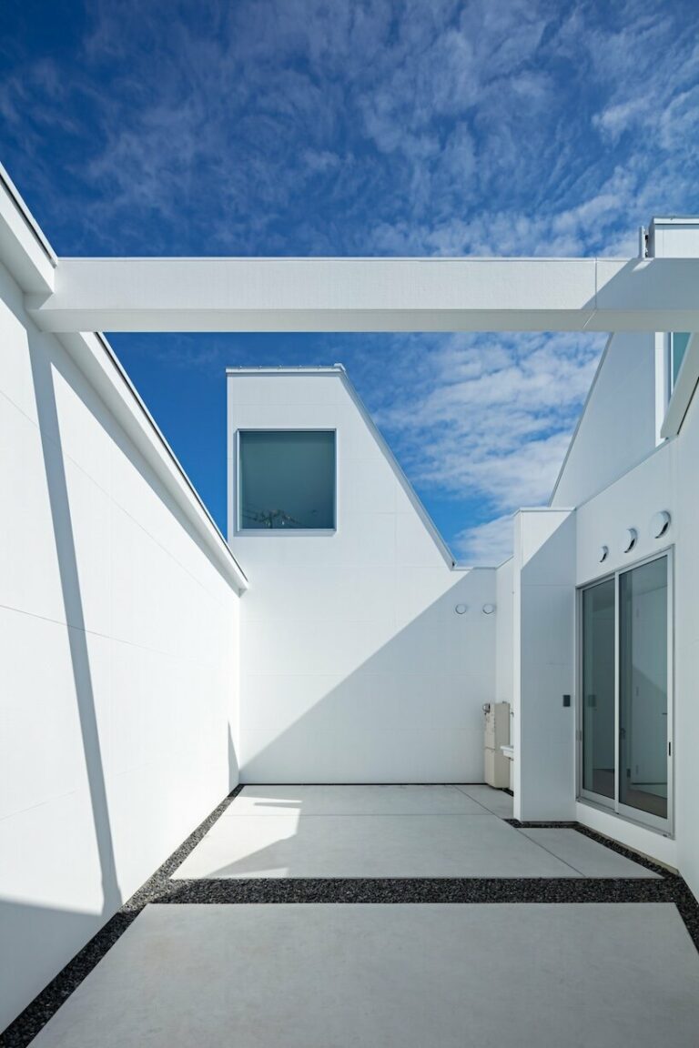 sculptural saw-tooth roof tops kenji ido's white residence in japan