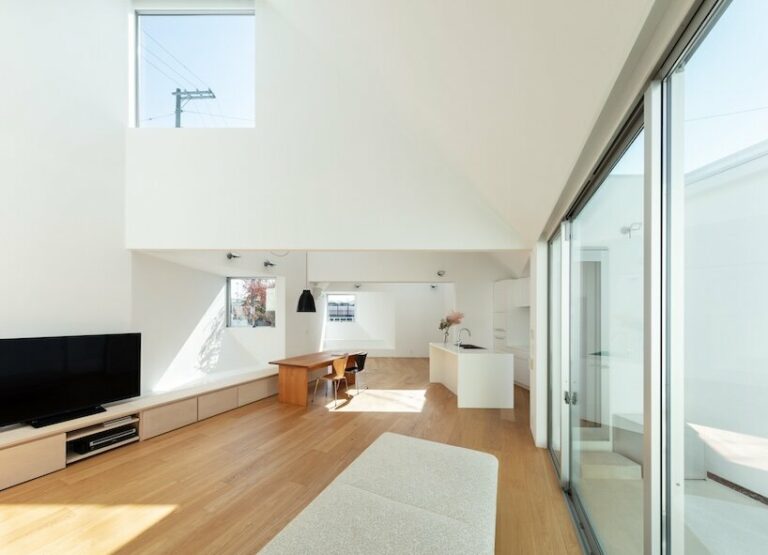 sculptural saw-tooth roof tops kenji ido's white residence in japan