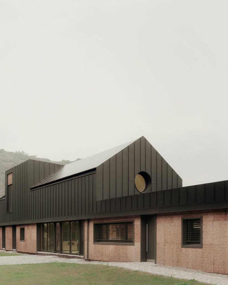 cork-covered border house by LCA architetti showcases sustainable ...