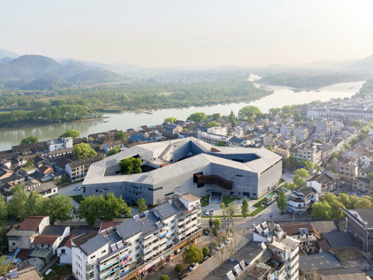 zhejiang lishui guyanhuaxiang art center by line+ spreads a fragmented ...