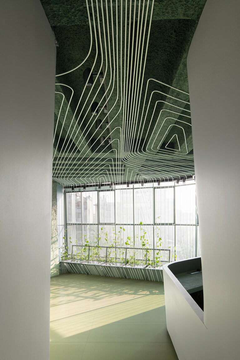 shape-shifting rod curtain and curved walls take over parkway clinic in ...