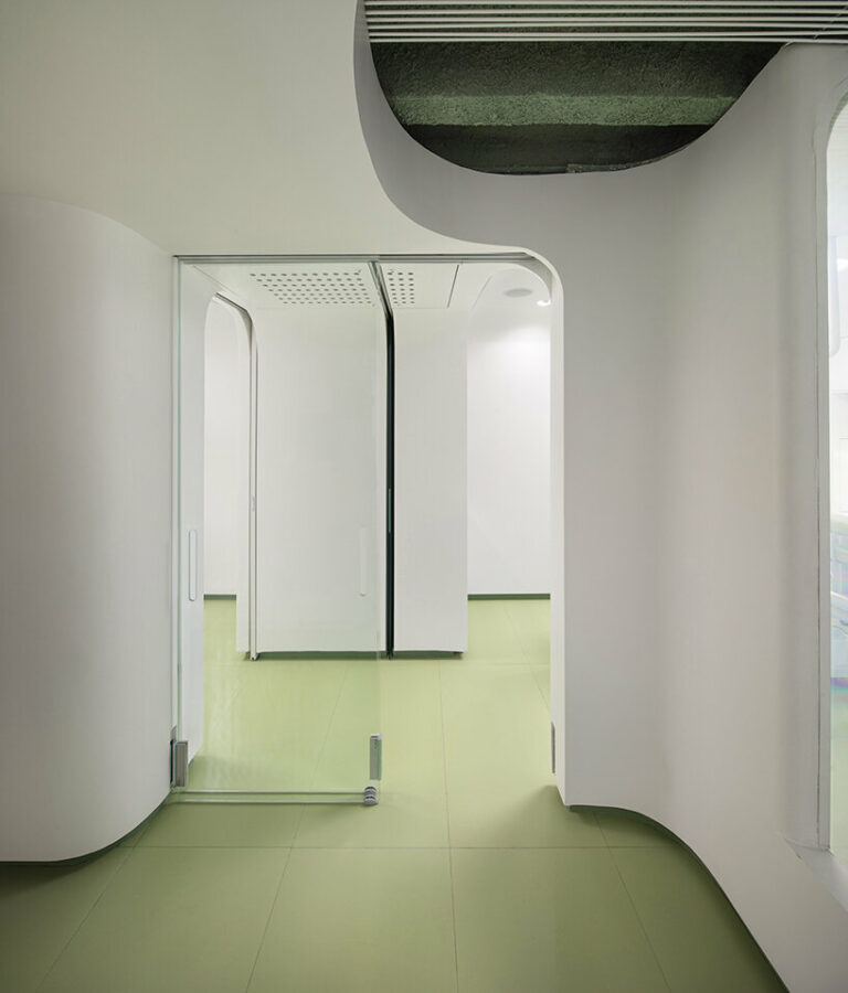 shape-shifting rod curtain and curved walls take over parkway clinic in ...
