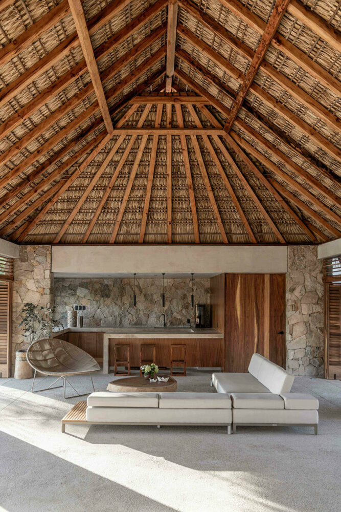stone walls and palm-thatched palapas blend tate house into the oaxacan ...