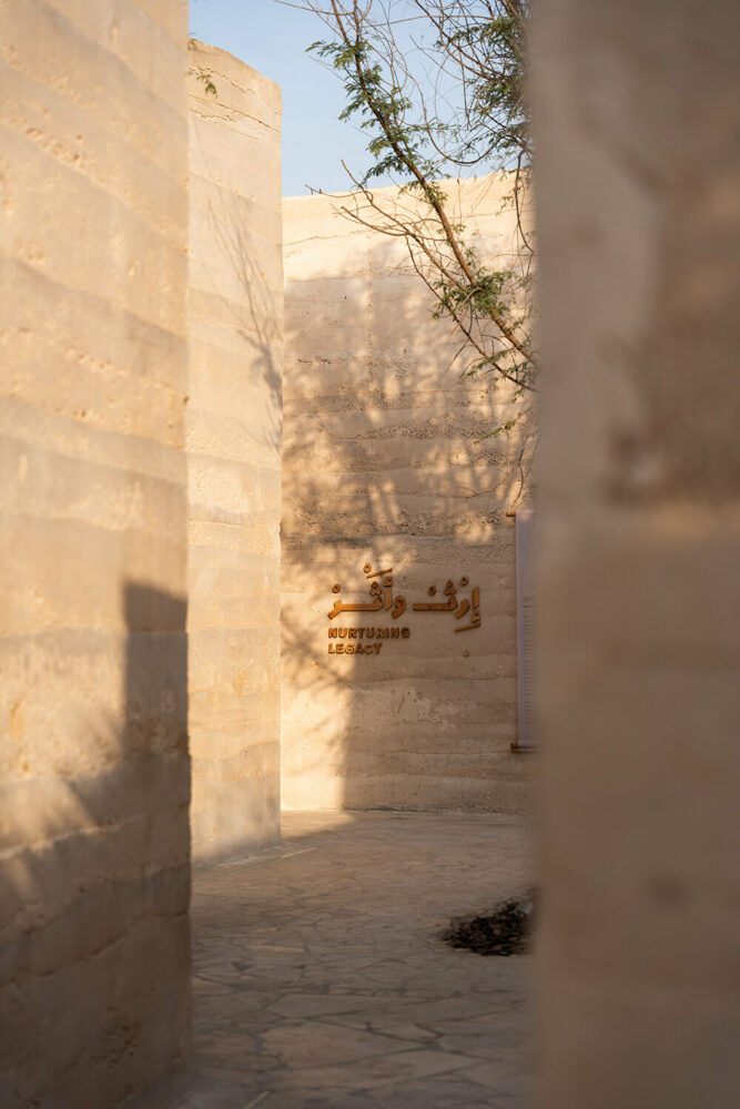 BIG sculpts rammed earth UAE pavilion at doha's international ...