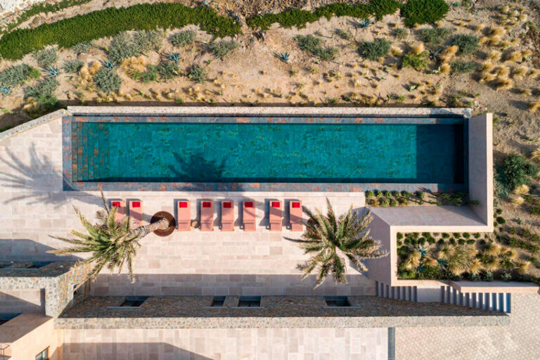 bobotis+bobotis plants terracotta-tiled coastal villa on mykonos' cliffside