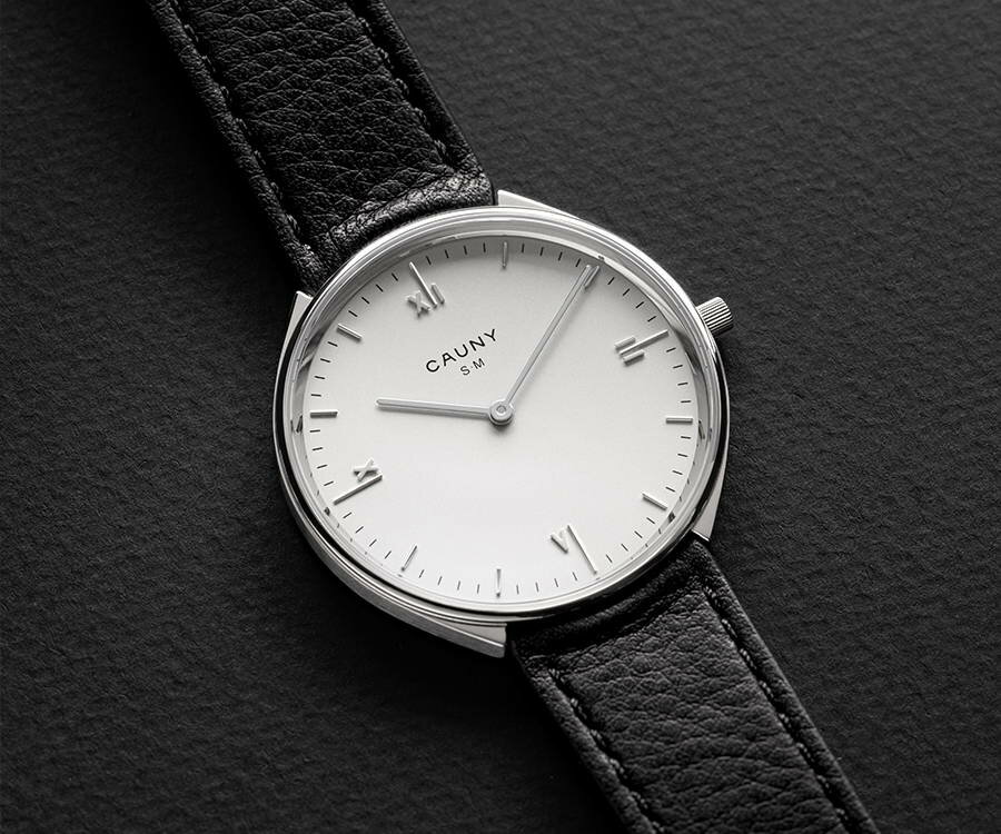 curved spring bars embrace cauny watch's case designed by eduardo souto ...