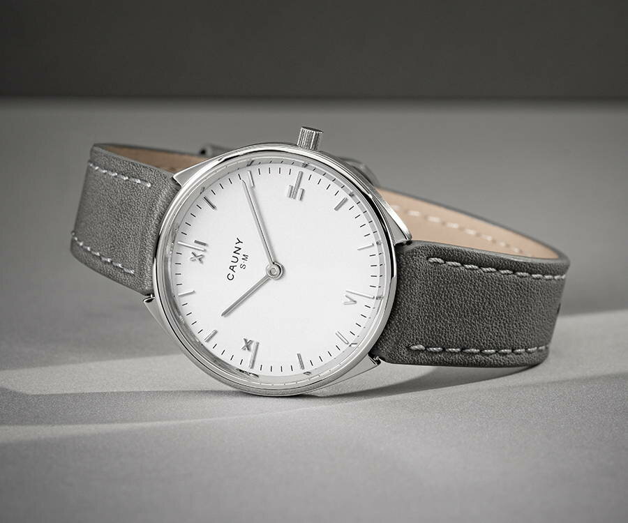 curved spring bars embrace cauny watch's case designed by eduardo souto ...