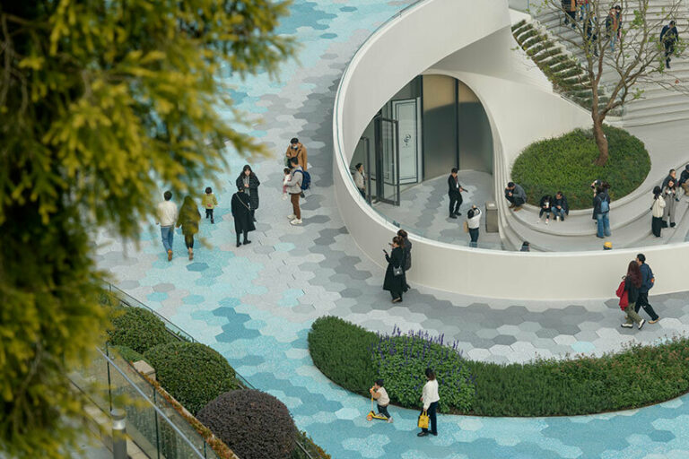 ocean wave-like paving by zaha hadid architects sweeps over chinese ...