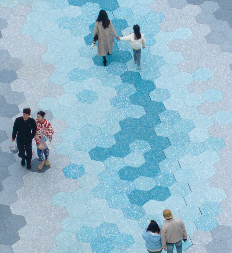 ocean wave-like paving by zaha hadid architects sweeps over chinese ...