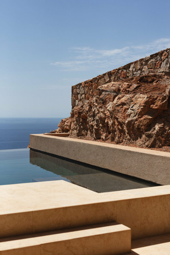 block722's gundari resort carves through the folegandros cliffs in greece