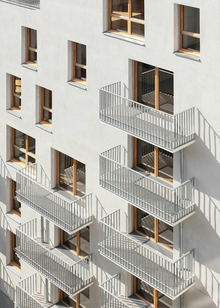 parisian residential complex by studio razavi + partners embraces ...