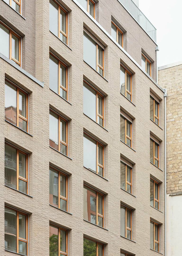 parisian residential complex by studio razavi + partners embraces ...