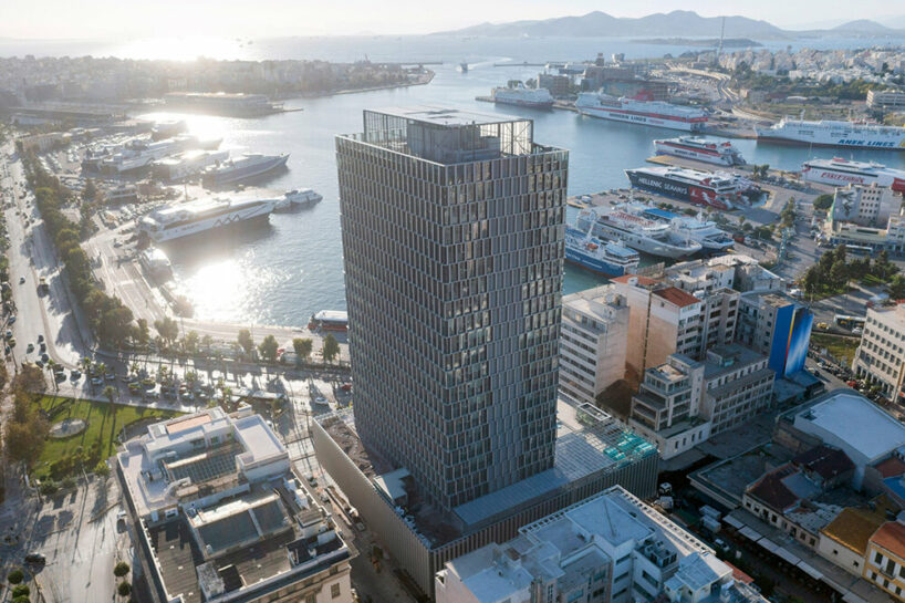 piraeus tower reopens in athens with spring pattern facade by PILA