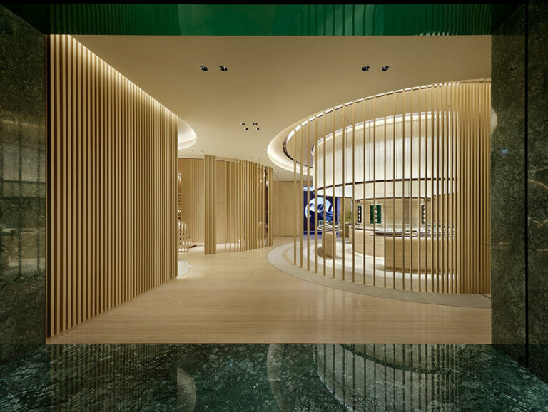 curiosity envelops rolex's ginza flagship in a double bezel pattern