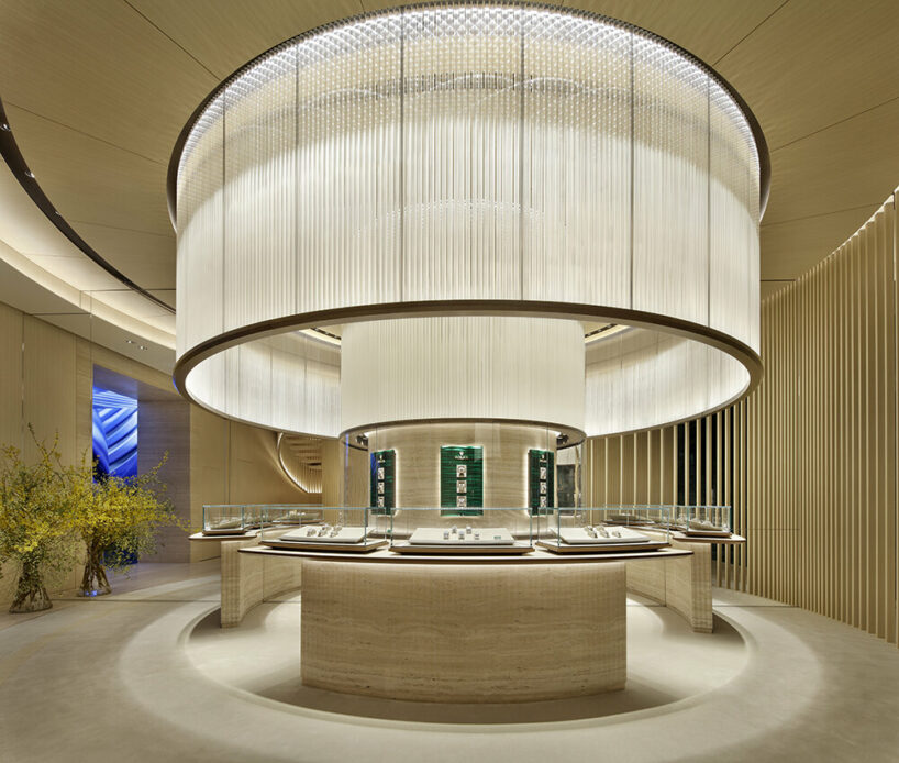 curiosity envelops rolex's ginza flagship in a double bezel pattern