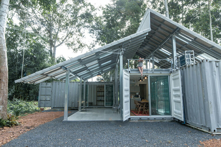 shipping containers shape prefabricated residence in thai forest