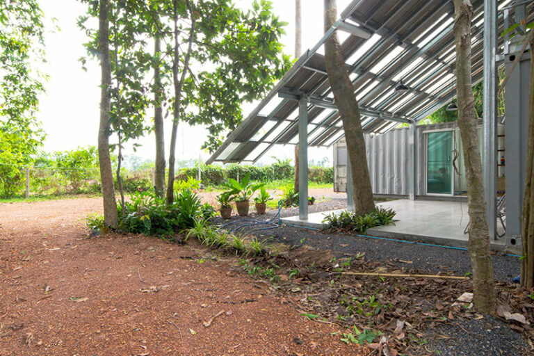 shipping containers shape prefabricated residence in thai forest