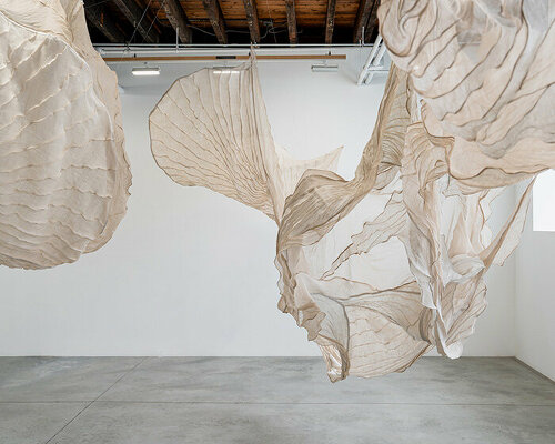 epic textile installation by joana vasconcelos sets the backdrop of ...