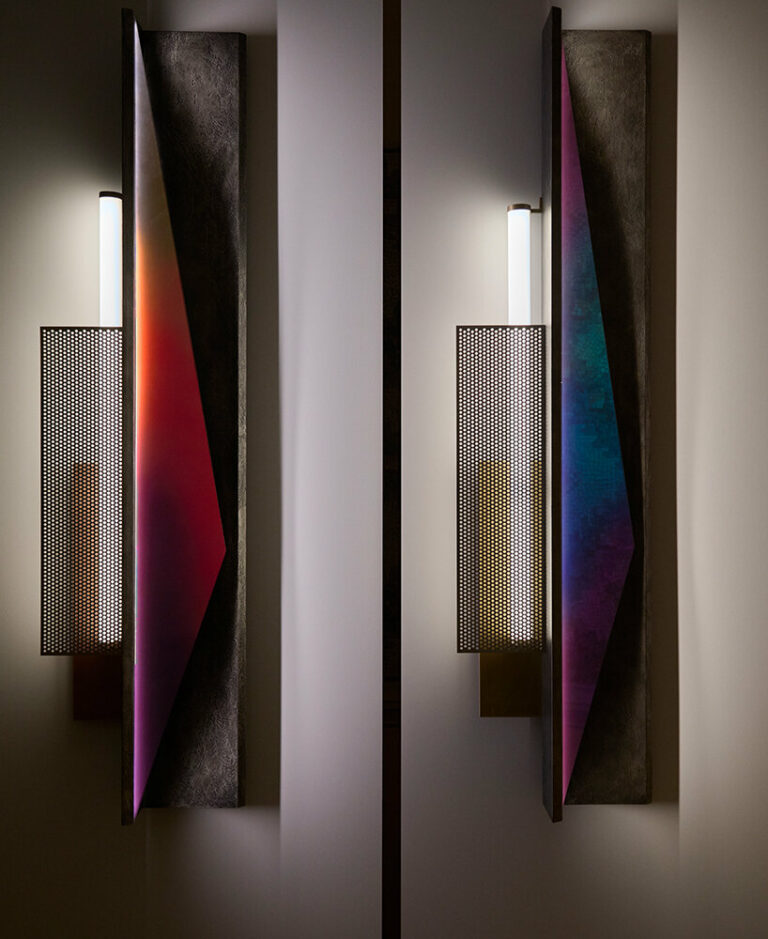 colorful mirrored planes of wall lamp by tarek dada cast transformative ...
