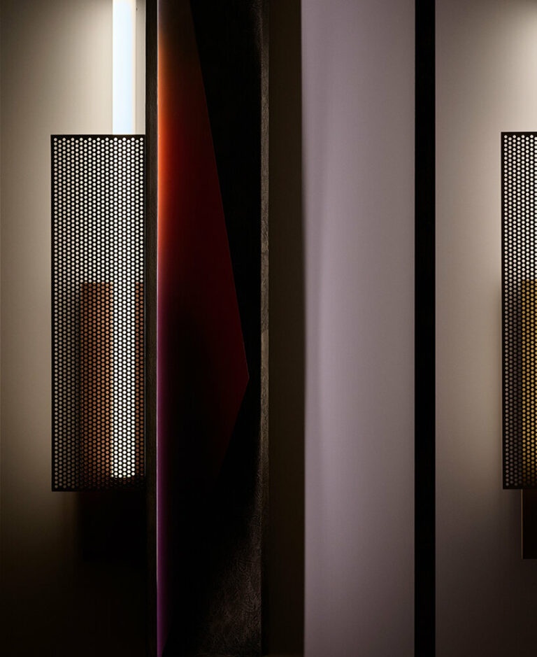 colorful mirrored planes of wall lamp by tarek dada cast transformative ...