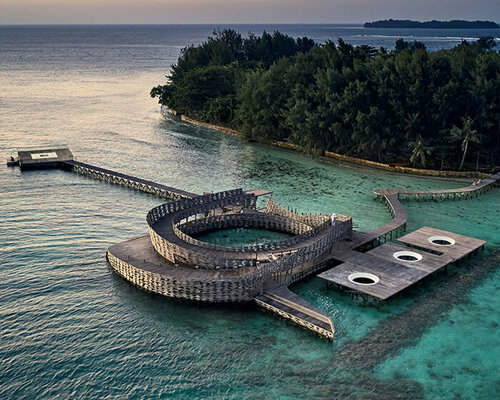 RAD+ar tops tropical residence in indonesia with green steep pitch roof