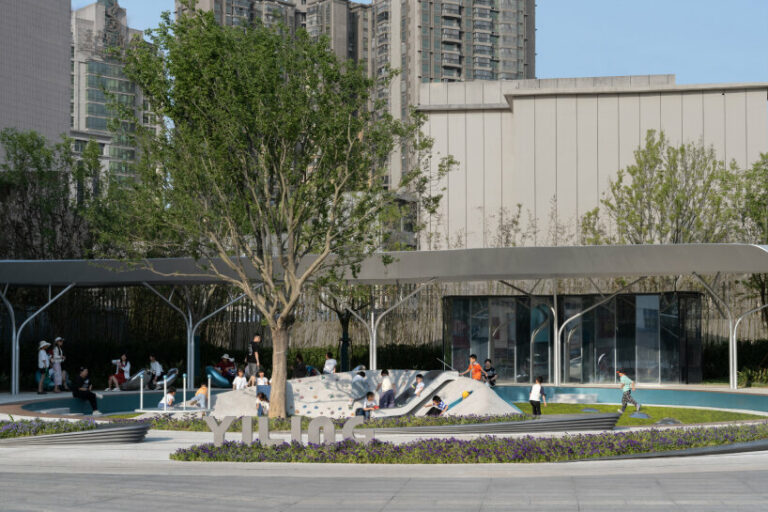 concentric pathways and gardens encircle HID's connective urban node in ...