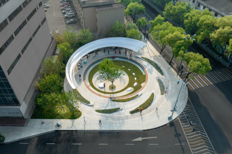 concentric pathways and gardens encircle HID's connective urban node in ...