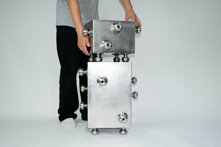 doorknob-adorned stainless steel stool by junha jang explores spatial boundaries