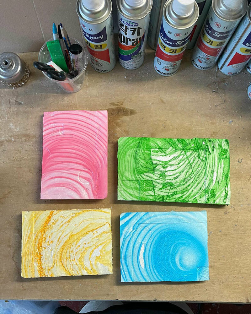 water transfer printing brings melting colors to life in jiwon jung's mosaic styrofoam chairs