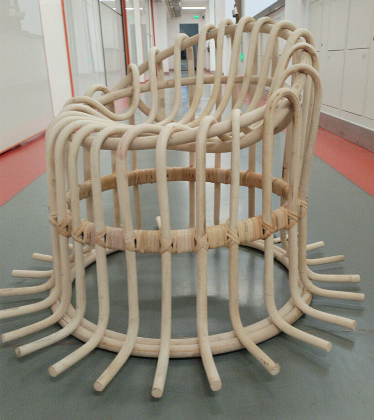 waterfall chair with smooth, flowy rattan curves reflects tranquility ...