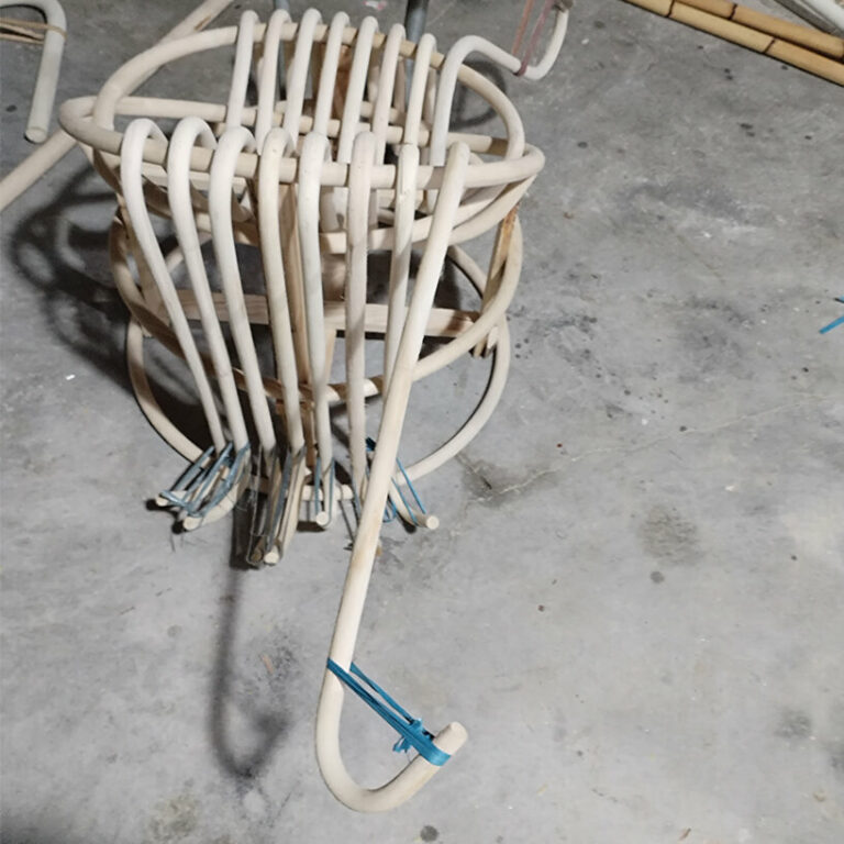 waterfall chair with smooth, flowy rattan curves reflects tranquility ...